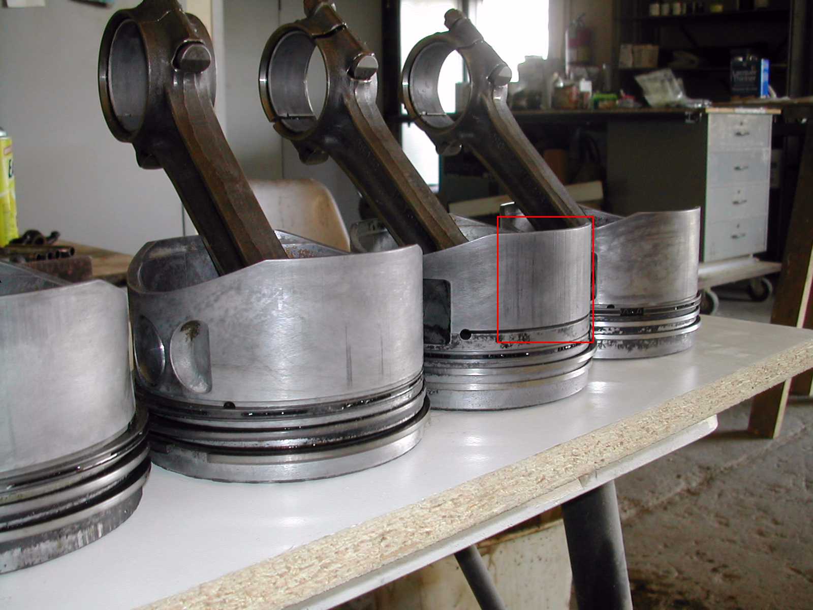 The third piston also appears to be a different casting. You can see ...